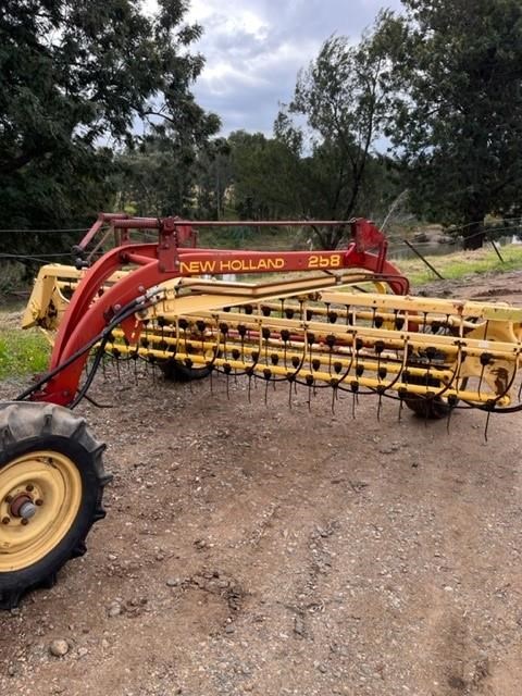 NEW HOLLAND DUAL RAKE HITCH WITH ROLABAR RAKES for sale (refcode TA1187595)
